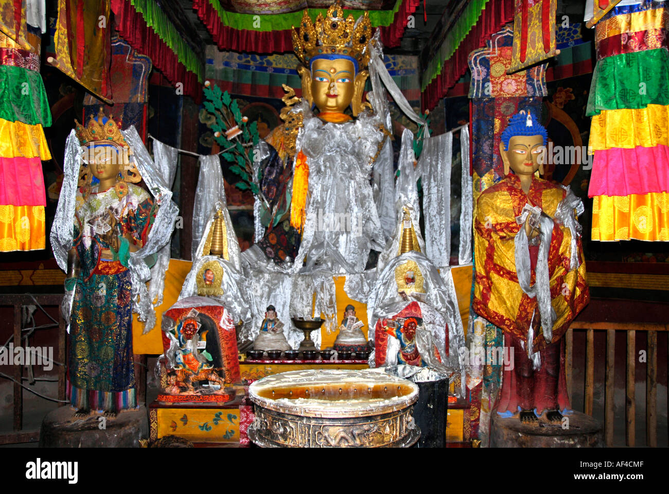 Statue of Buddha Sakyamuni in a temple Samye Monastery Tibet China ...