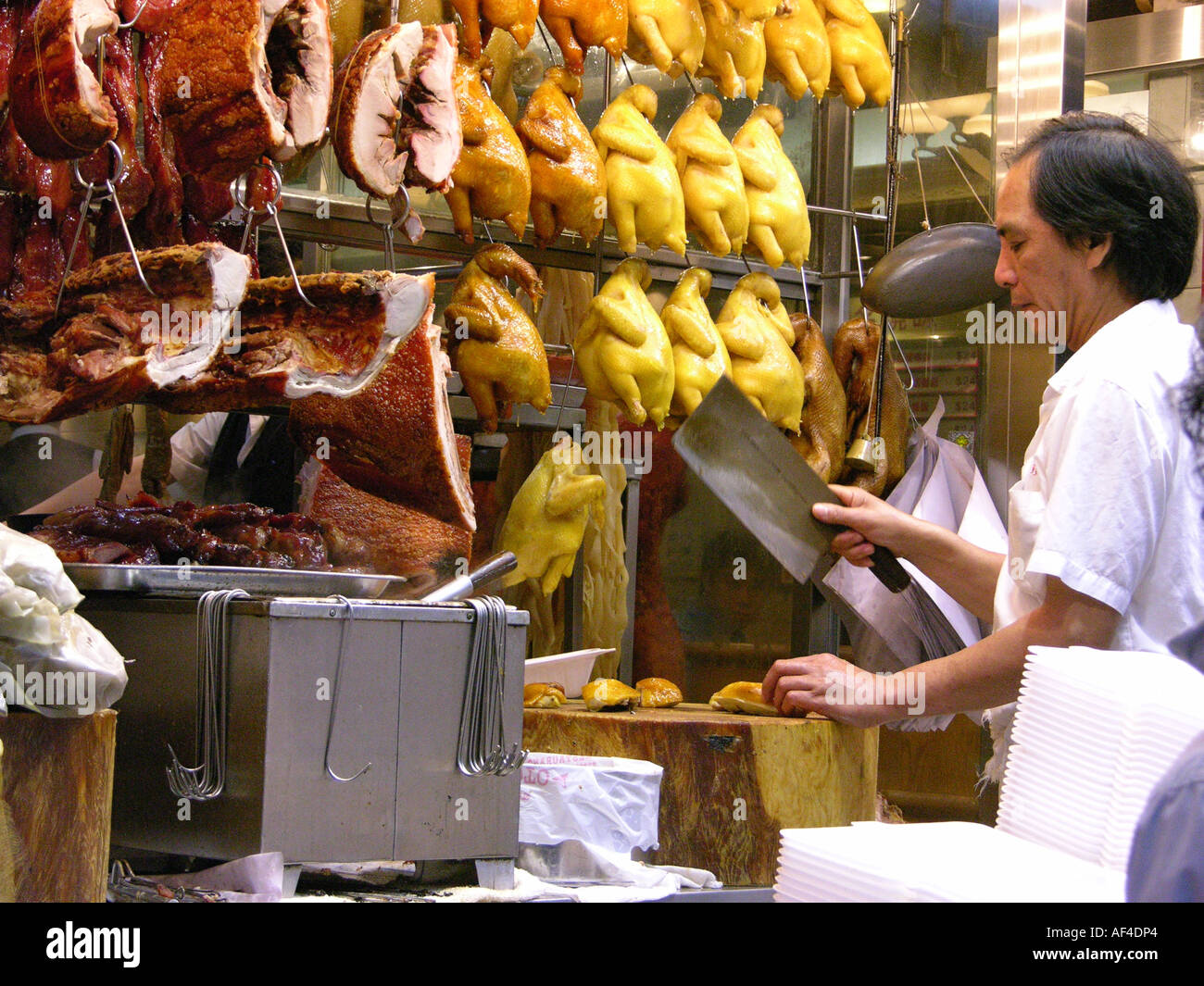 Butcher on a market in Hong Kong, China, Asia Stock Photo - Alamy