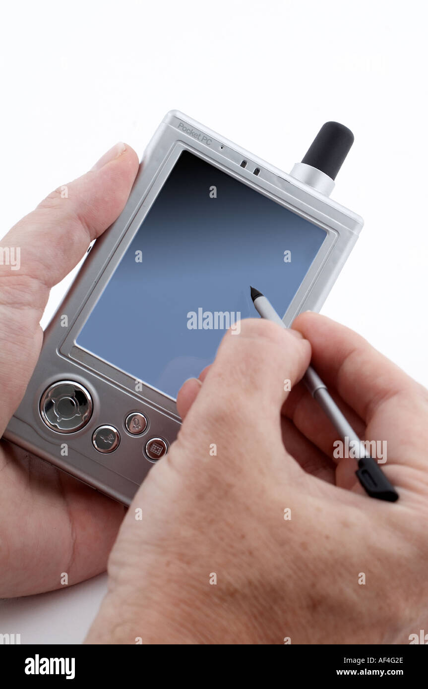 Hand with handheld pocket pc gps unit clear screen Stock Photo - Alamy