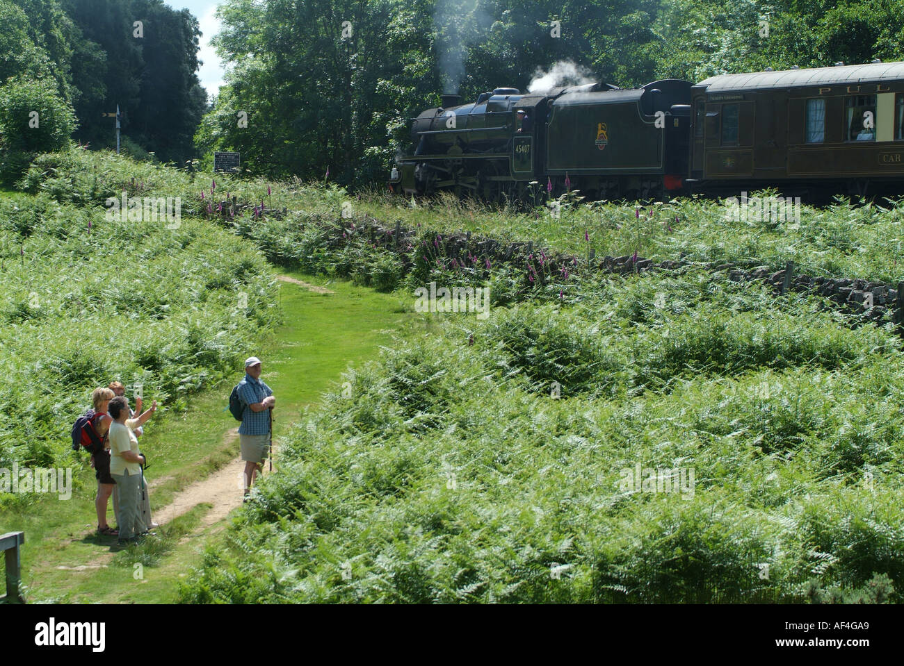 People waving to train hi-res stock photography and images - Alamy