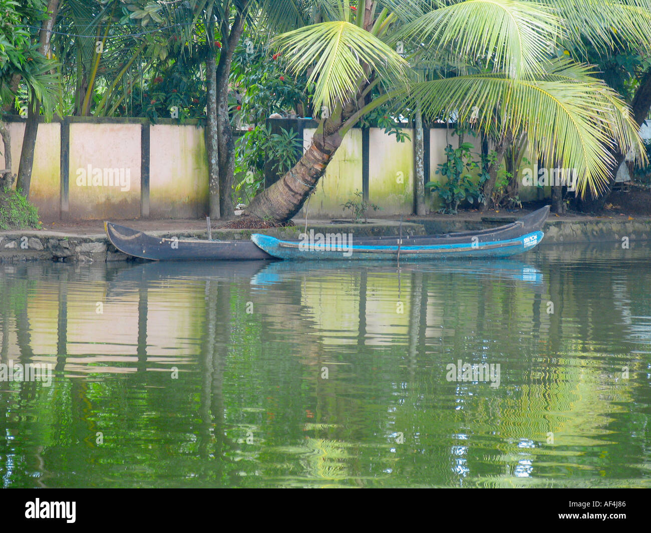 Landscape—Small boats for the general transport in backwaters of Kerala ...
