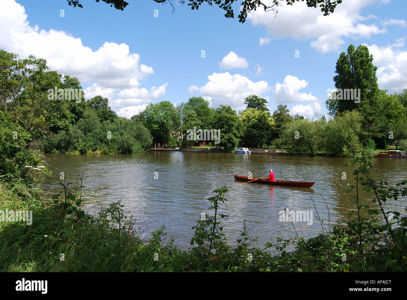 Wooden rowing boat on River Thames, Runnymede, Surrey, England, United ...
