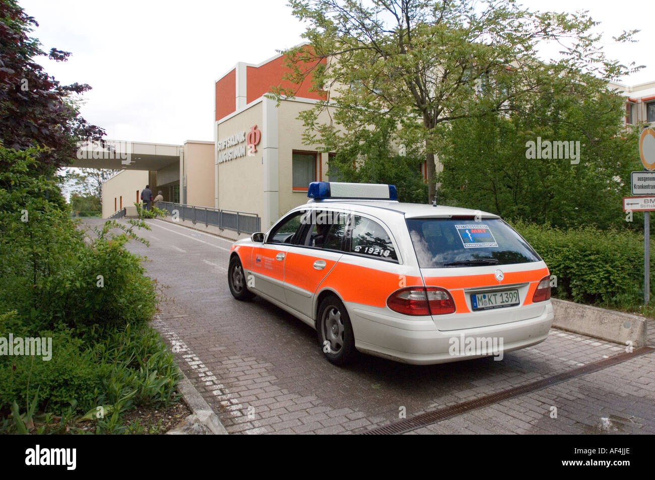 Physician police car on hospital ramp Stock Photo - Alamy