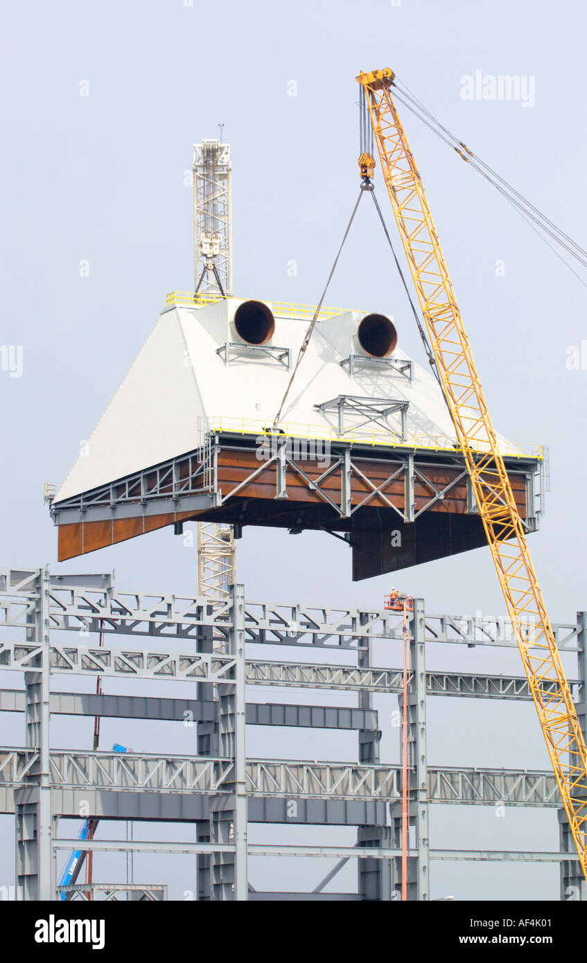 Two cranes with a capacity of 1200 and 800 tons lift a 500 ton ...