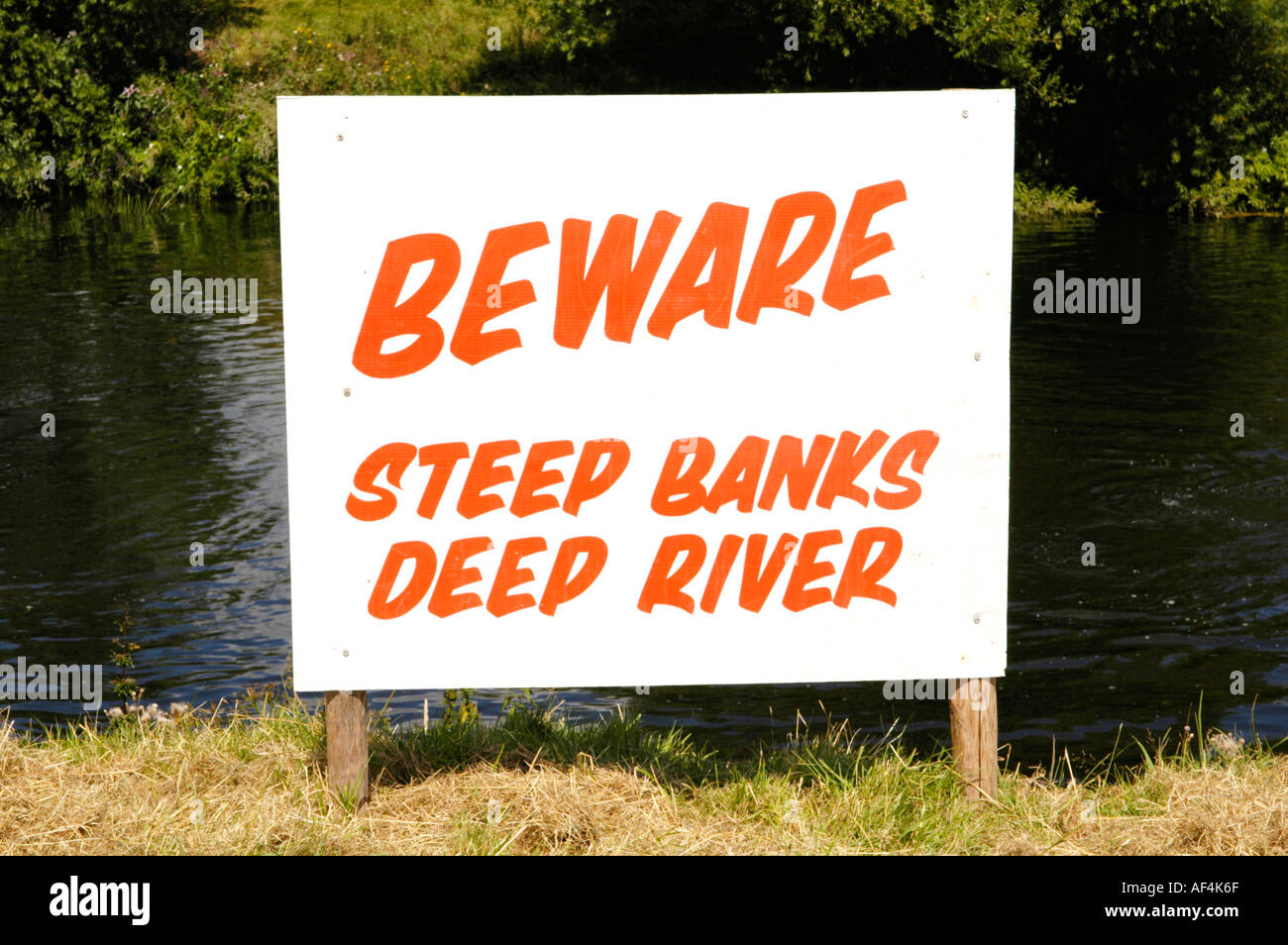 BEWARE STEEP BANKS DEEP RIVER danger sign on the River Wye at Sellack ...