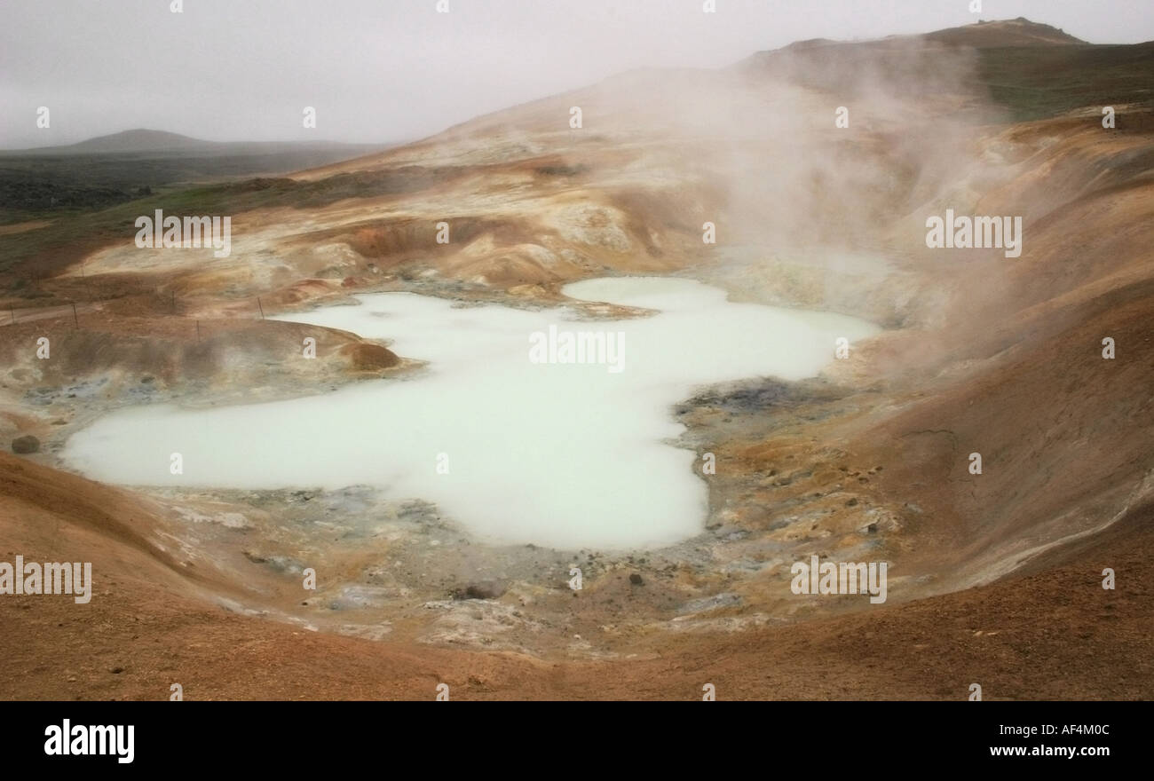 A steaming pool of geothermally heated water at Krafla near Myvatn Lake ...