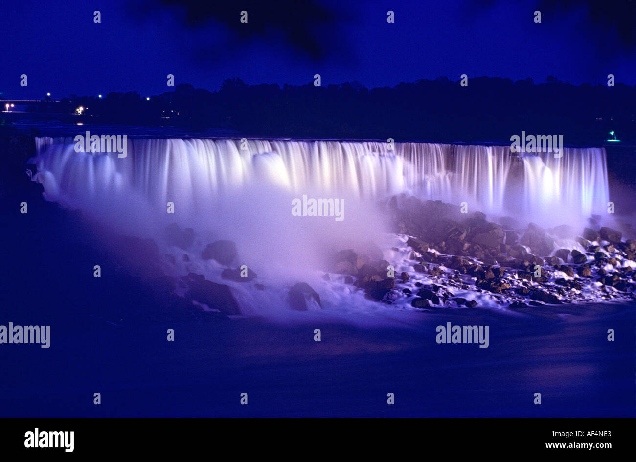 The American Falls part of Niagara waterfalls complex illuminated in ...