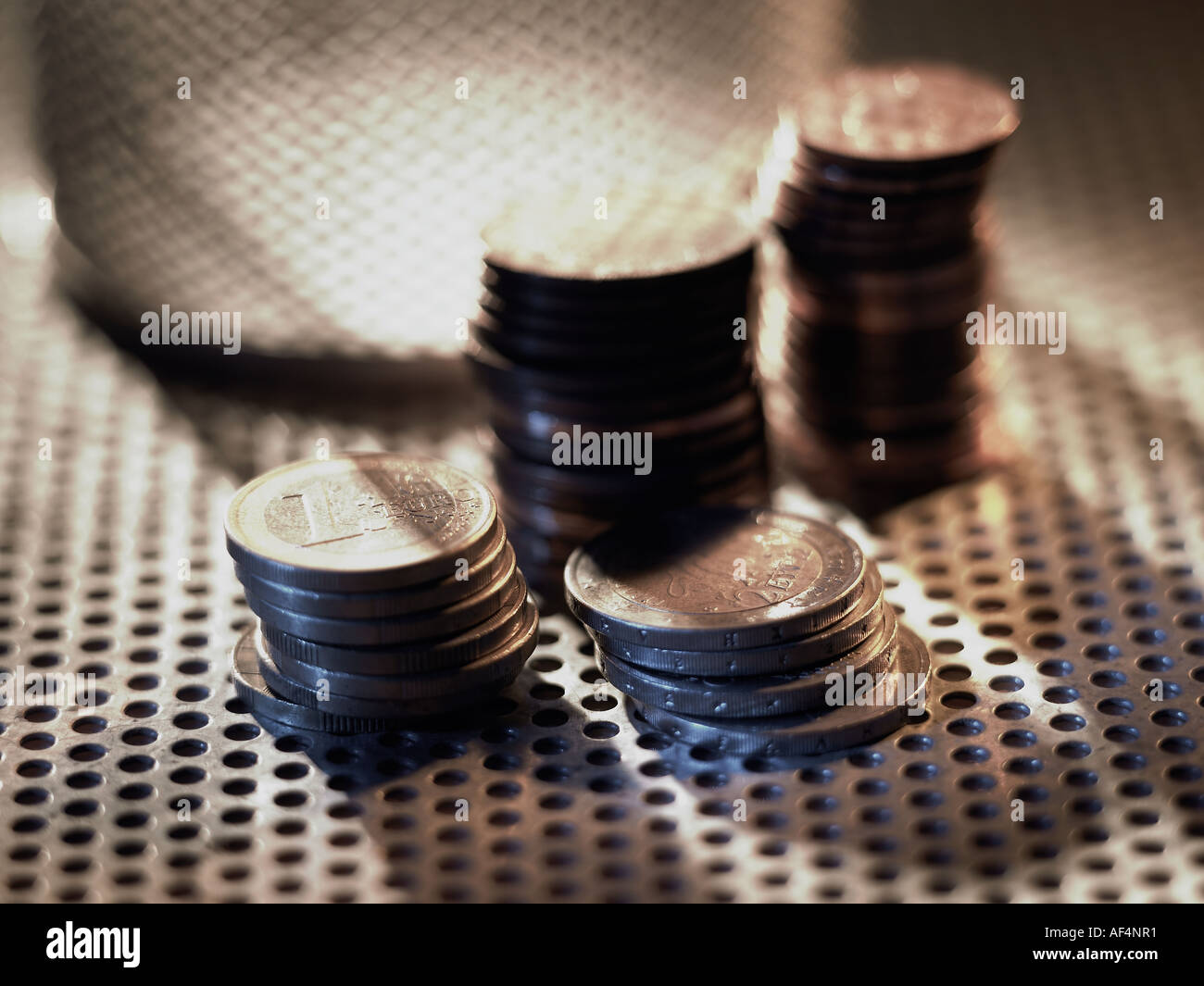 piles of coins Stock Photo - Alamy