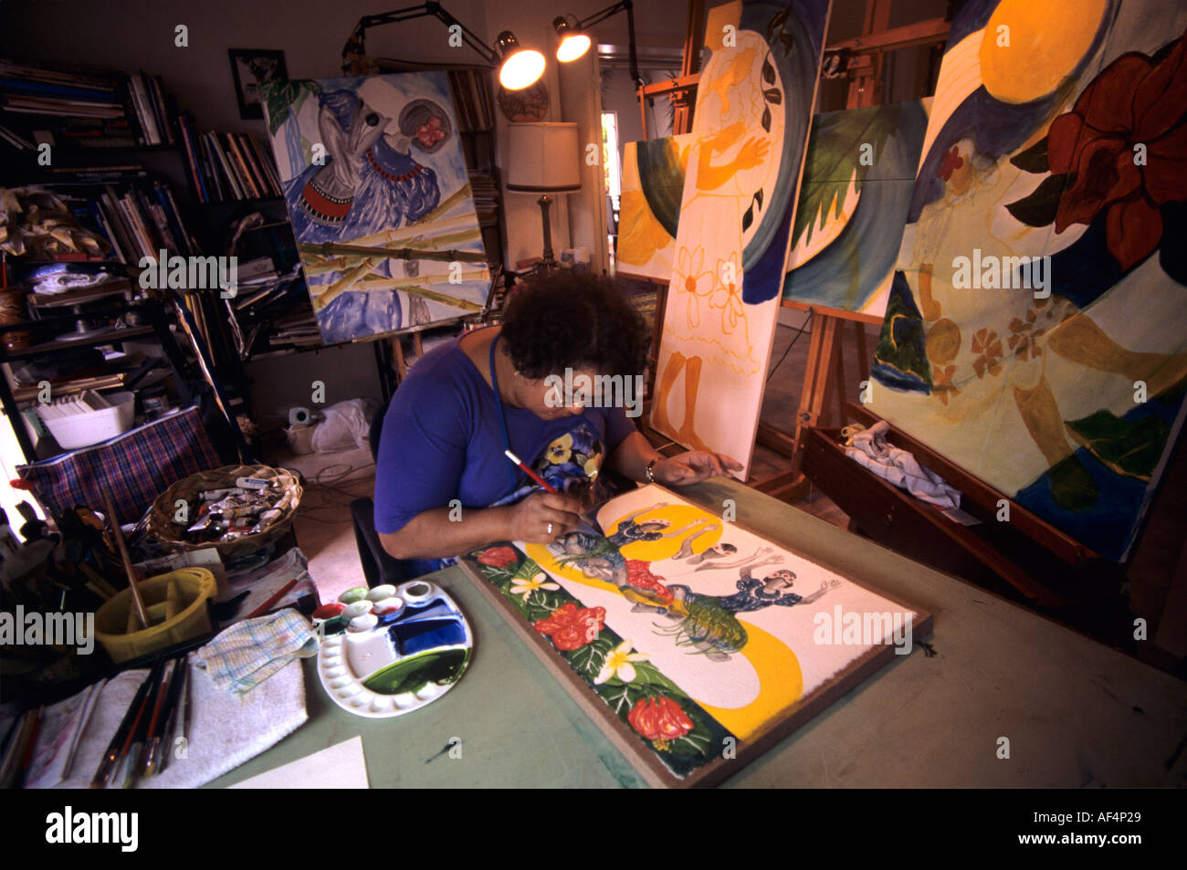 Aboriginal Torres Strait Islander artist Ellen Jose at work painting in ...