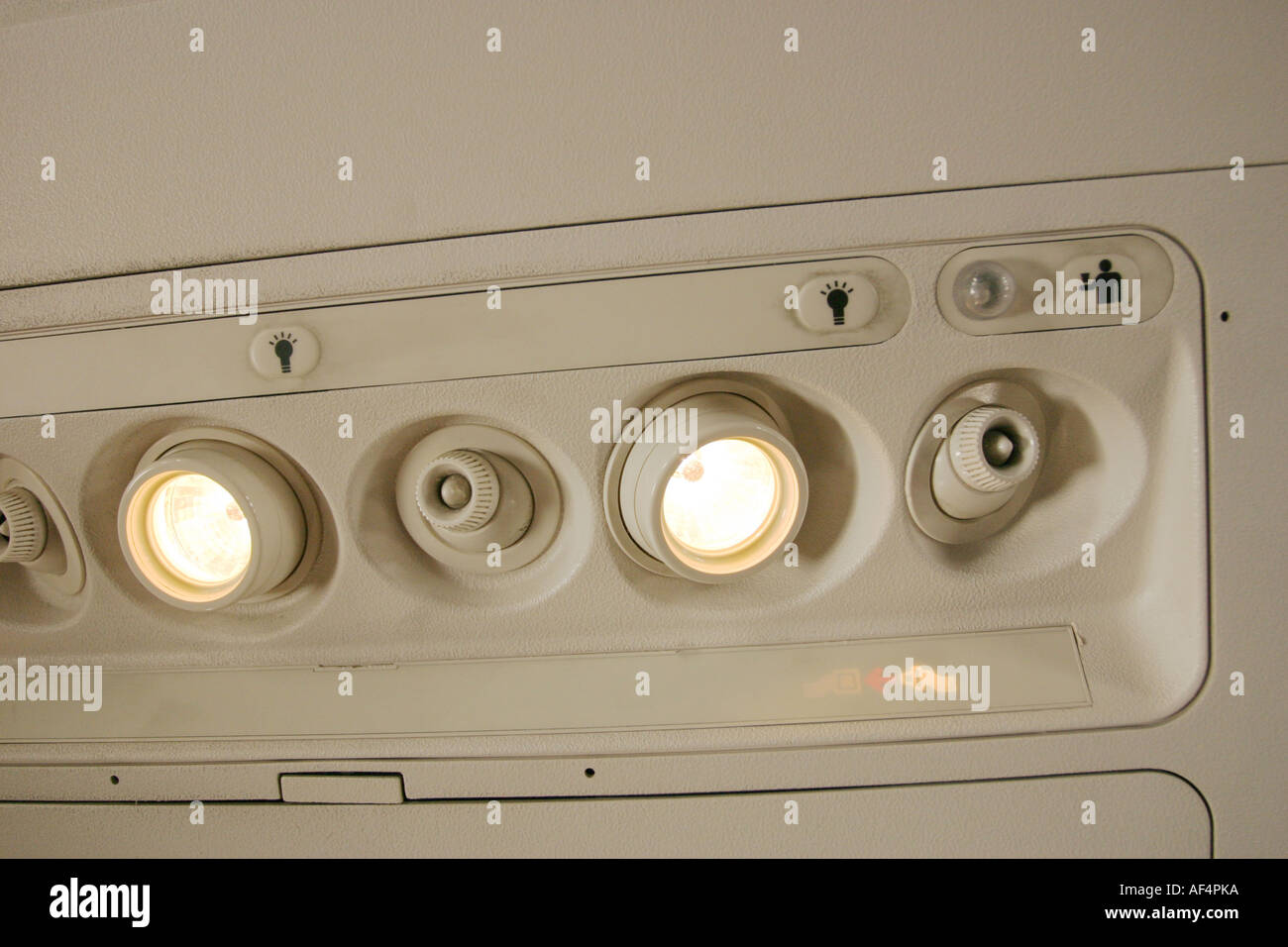 Lamps and buttons inside an airplane Stock Photo - Alamy