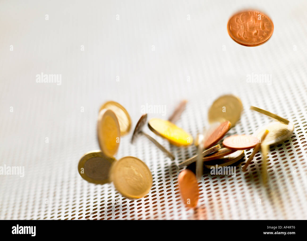 Gold coins falling from sky hi-res stock photography and images - Alamy