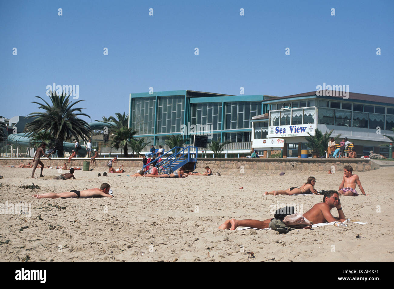 Sunbathers and beach front at Swakopmund Namibia Stock Photo - Alamy