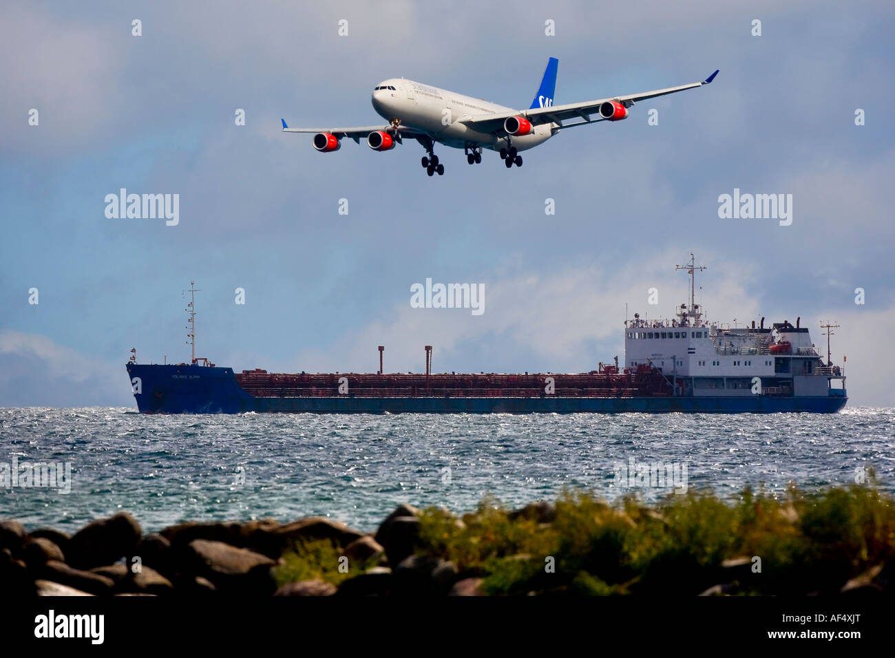Ship and flight transportation Stock Photo - Alamy