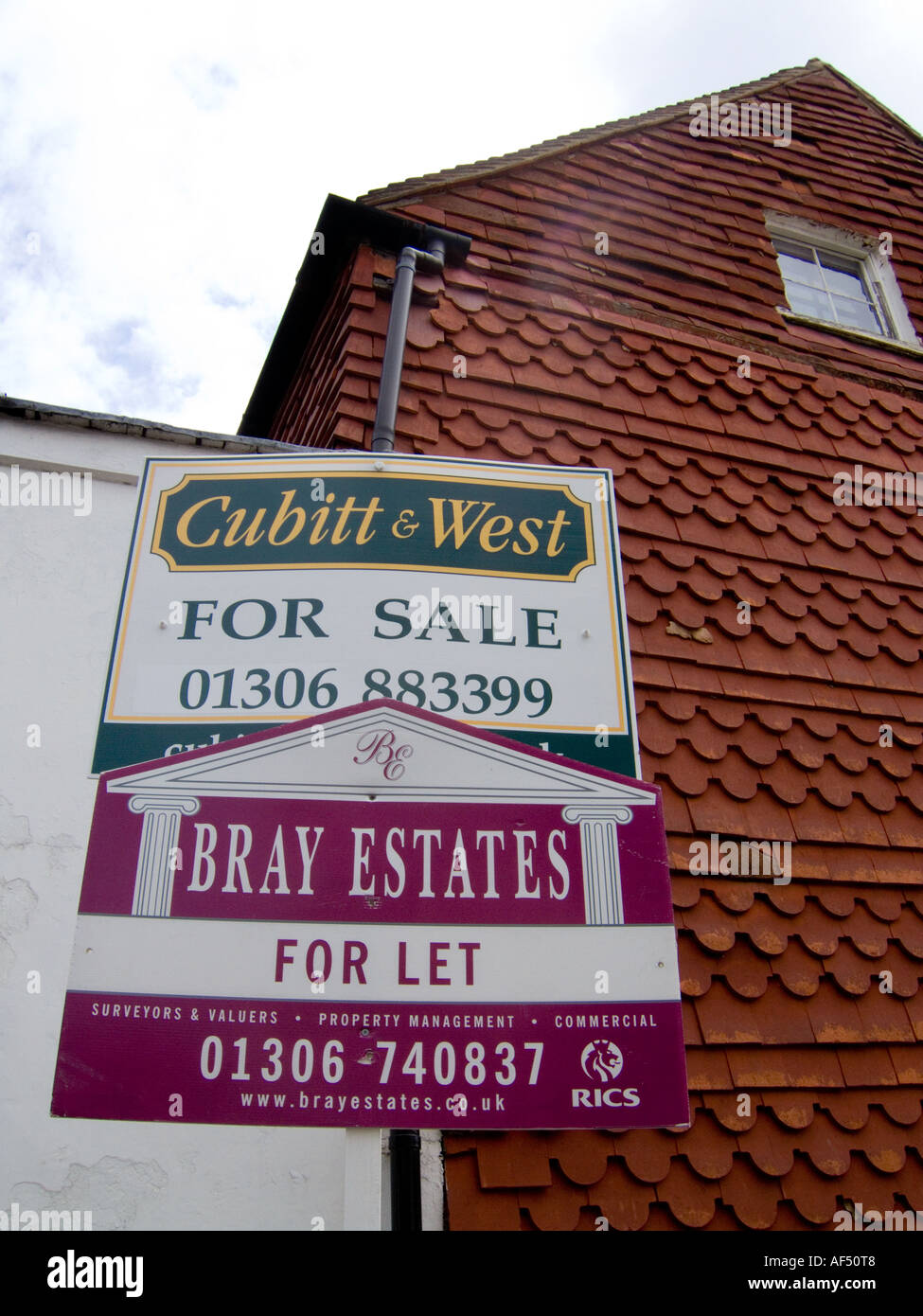 for sale signs outside buildings Stock Photo - Alamy