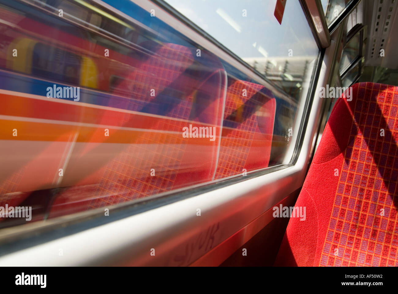 train window with passing train looking out of a train window Stock ...
