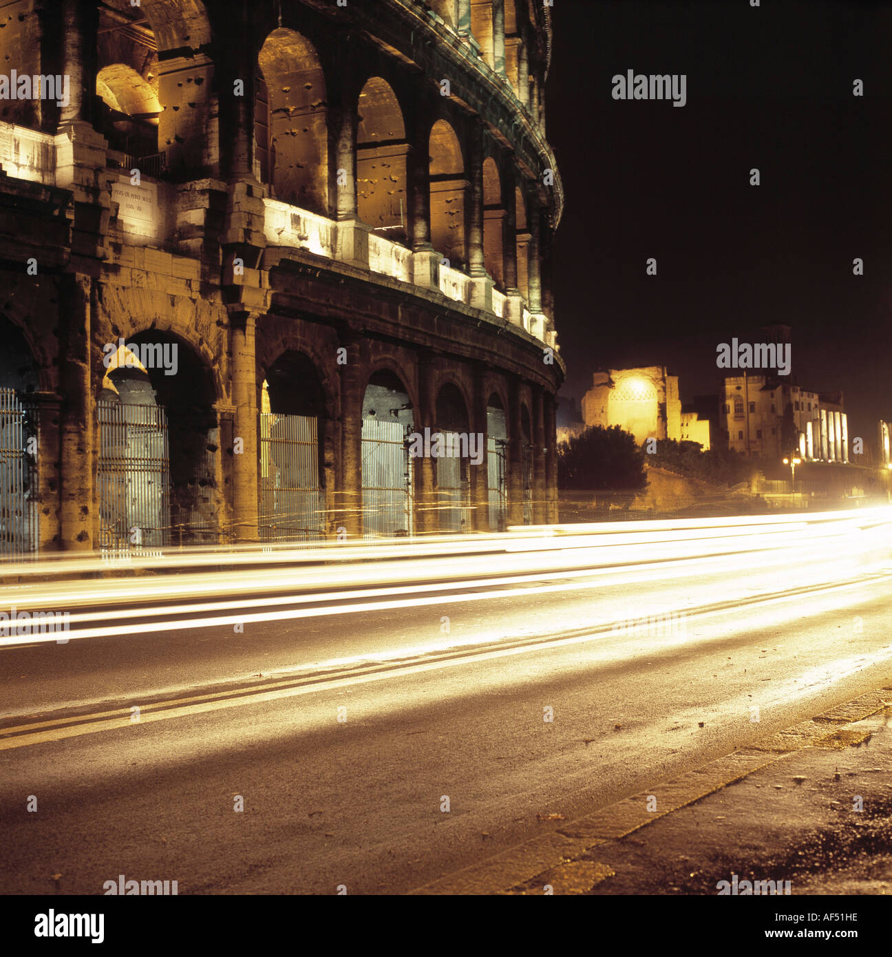 Traffic in front of a coliseum, Colosseum, Rome, Italy Stock Photo - Alamy