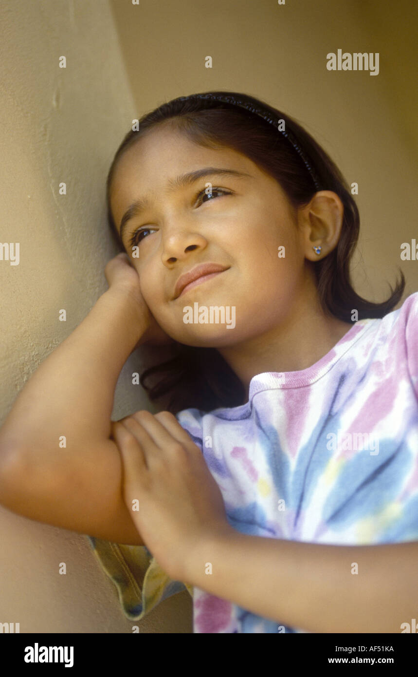 Close-up of a girl thinking Stock Photo - Alamy