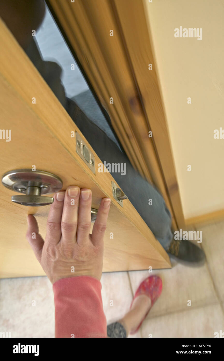 Foot breaking in the door hi-res stock photography and images - Alamy