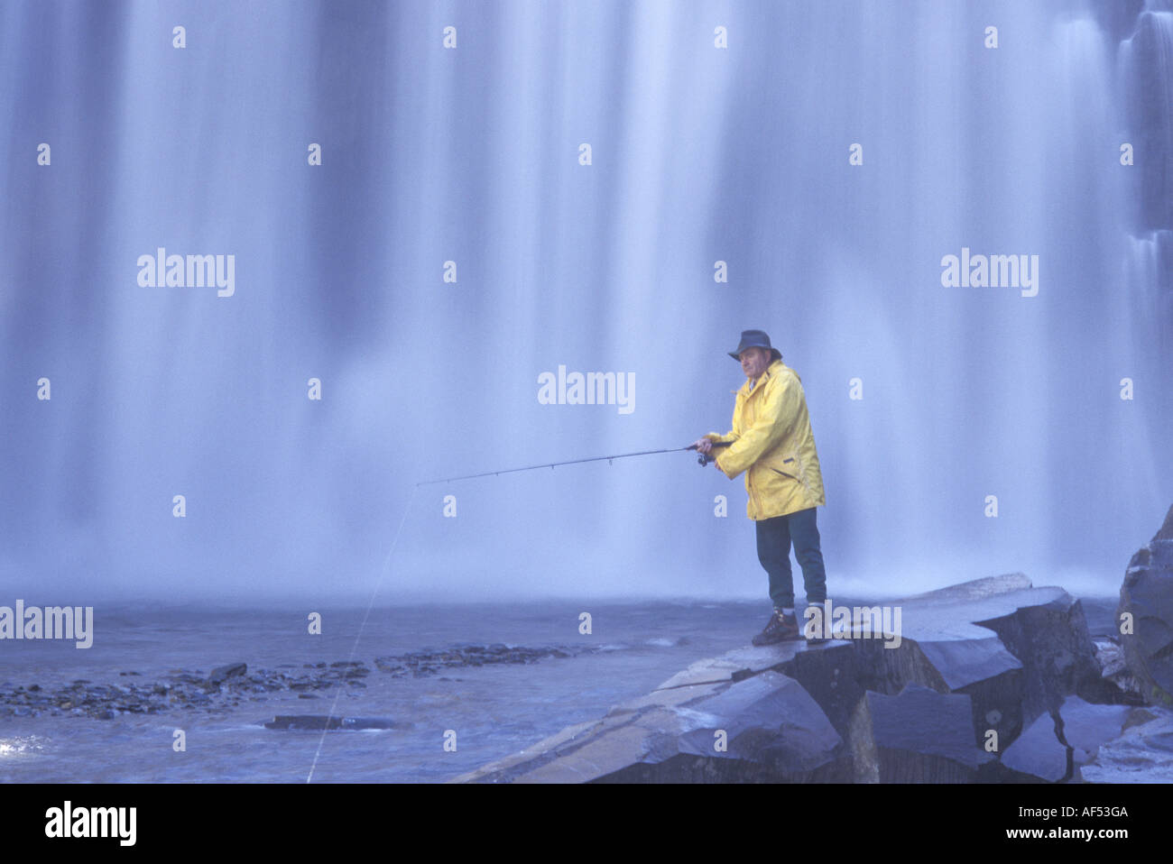Man stand rock near hi-res stock photography and images - Alamy