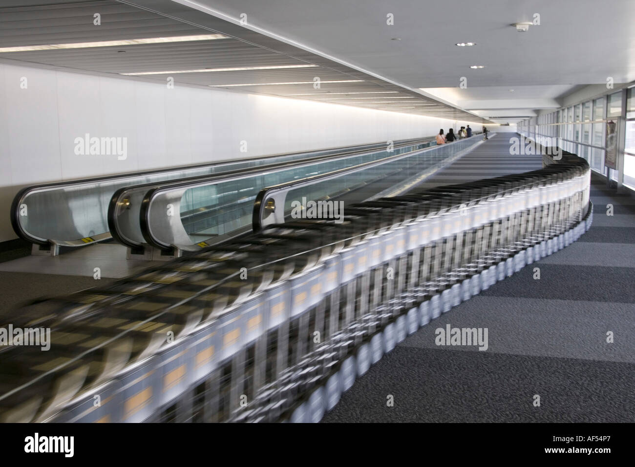 Moving walkway in an airport Stock Photo - Alamy