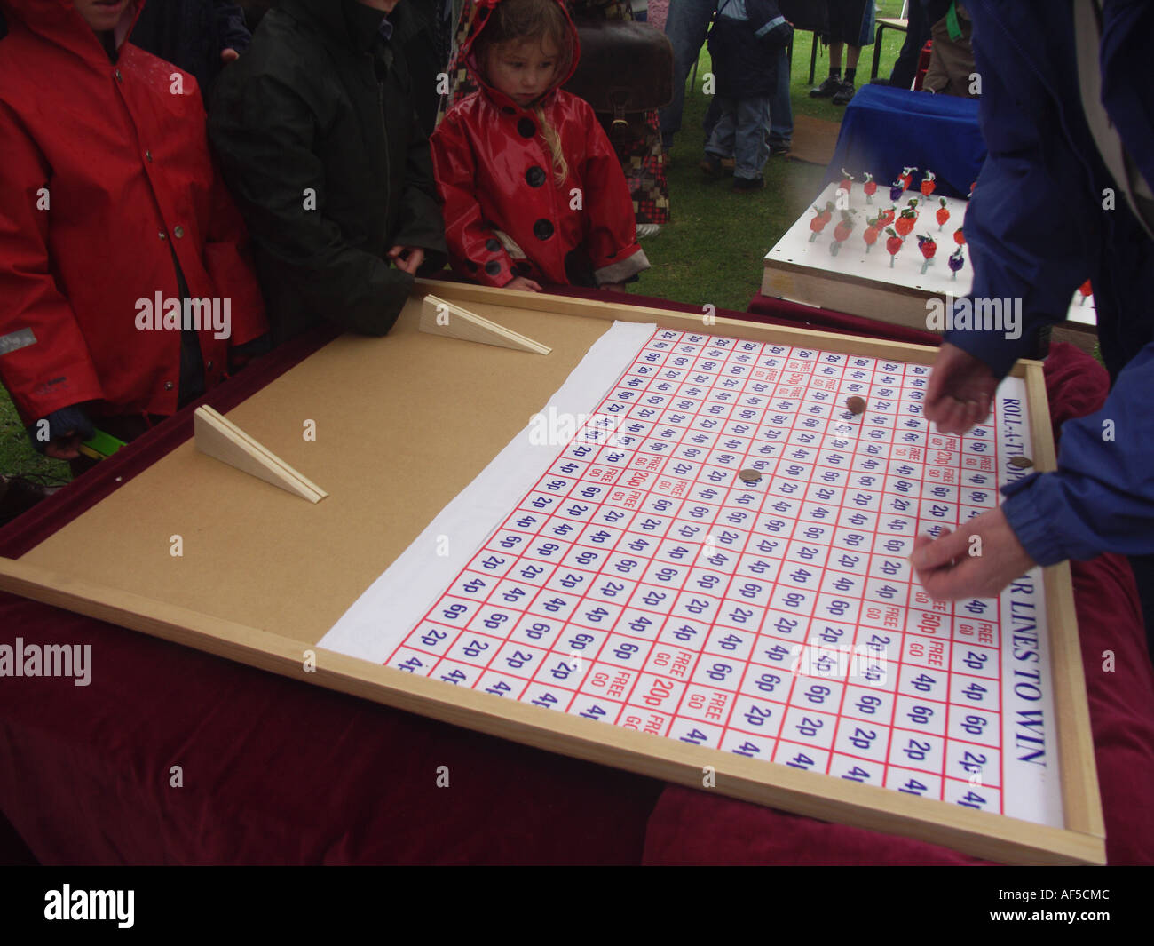 Roll a coin game hi-res stock photography and images - Alamy