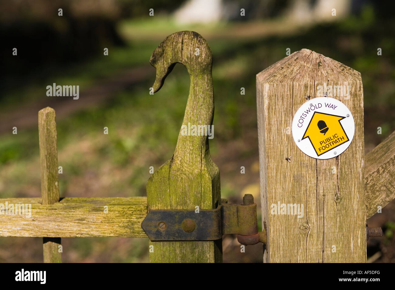 Kissing gate and swans head decorative woodwork on the Cotswold Way ...