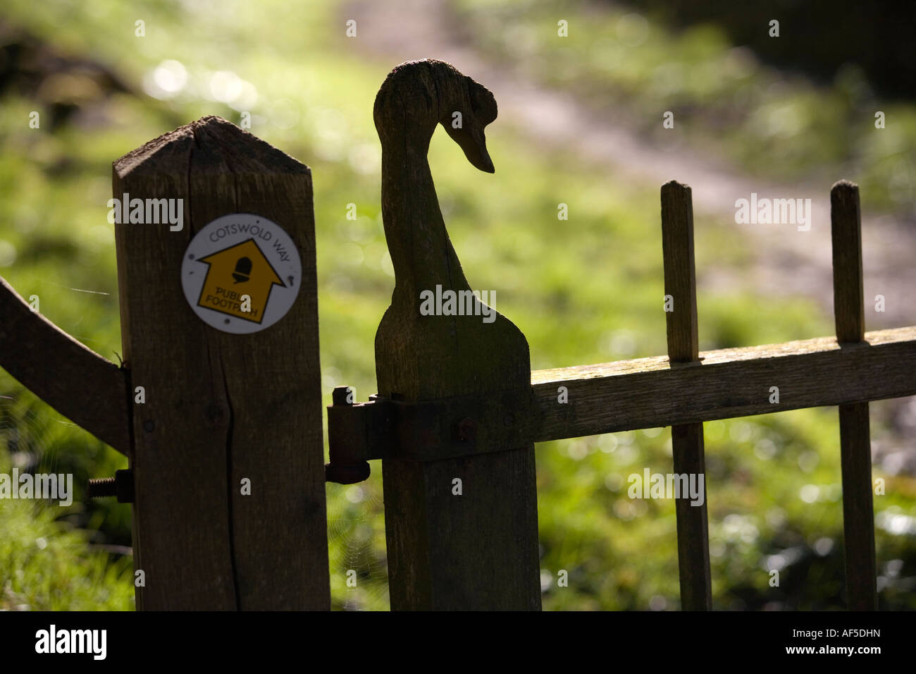 Kissing gate and swans head decorative woodwork on the Cotswold Way ...