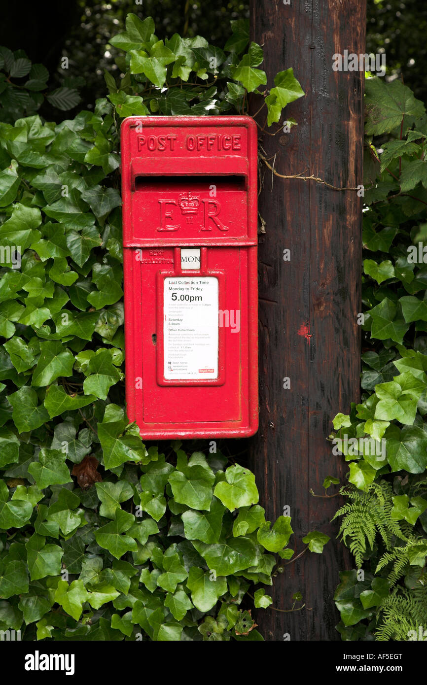 English red postbox in the countryside Stock Photo - Alamy