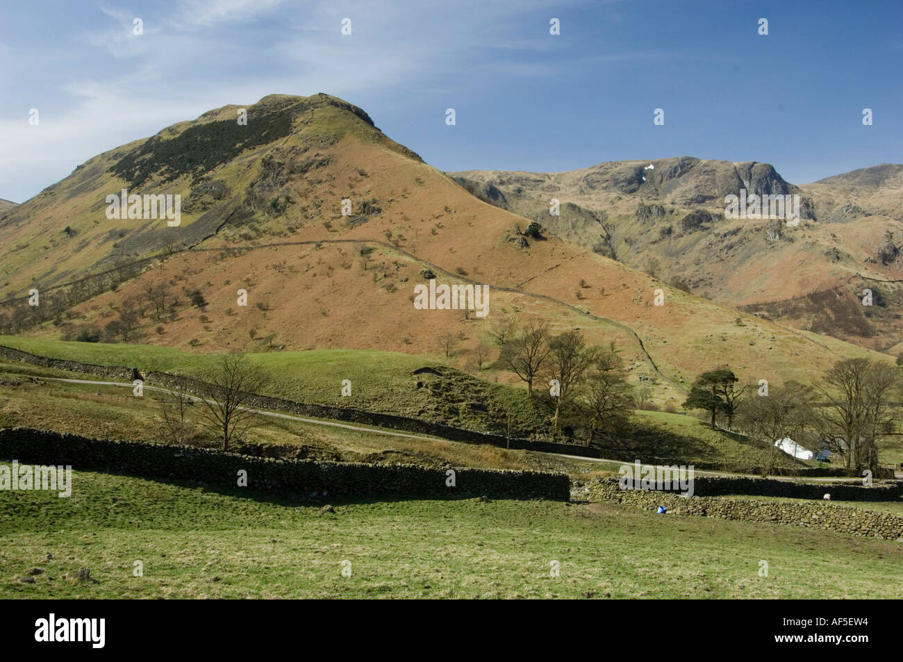 lake district autumn showing hills and fall colours on sunny day with ...