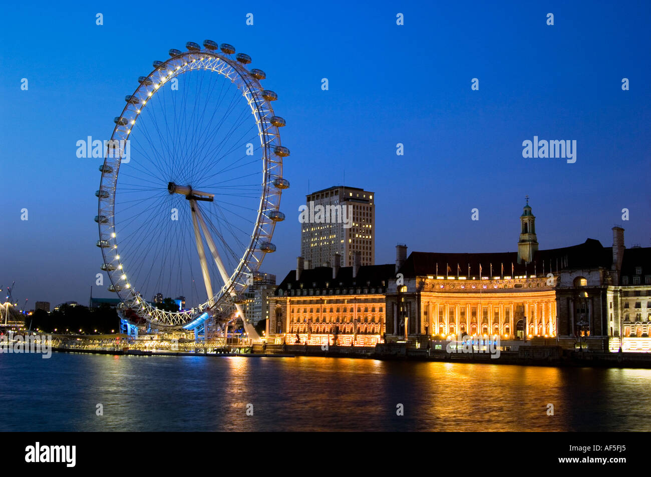 london eye at night shot from westminster bridge london england uk ...