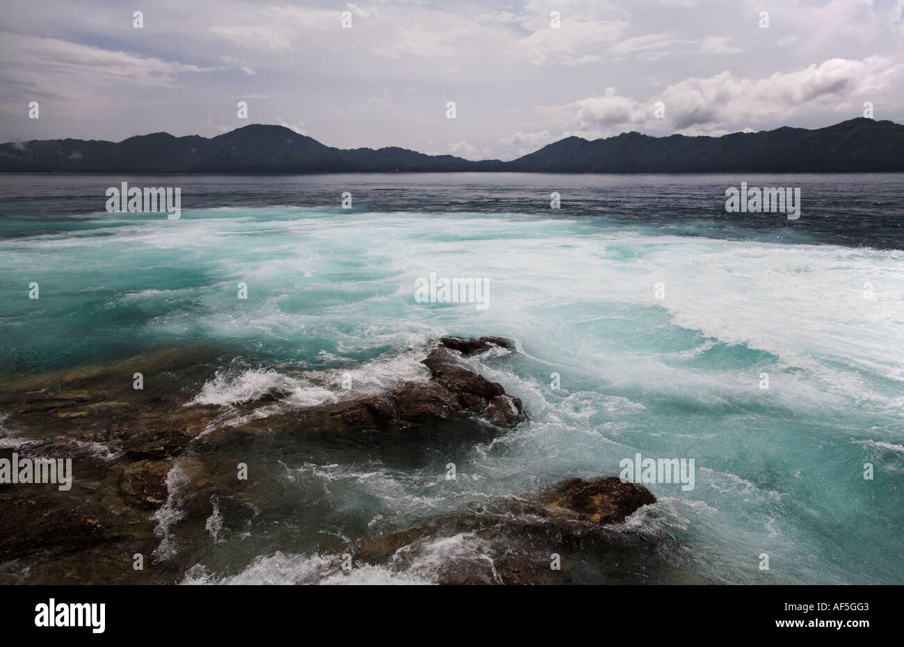white water churned up flowing into lake tazawa blue Stock Photo - Alamy