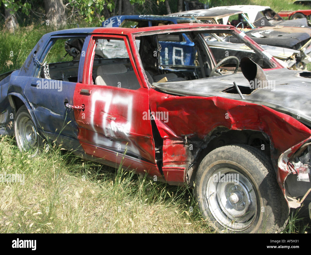 Wrecked Race Cars Stock Photo - Alamy