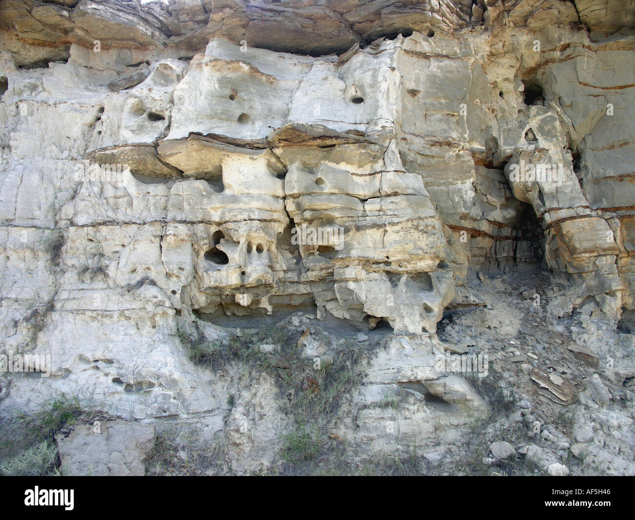 Holes in Rock Layers Stock Photo - Alamy
