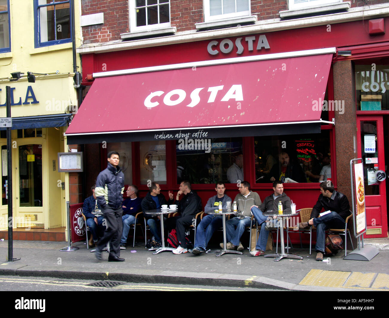 Costa coffee with people outside at tables Old Compton Street west end ...