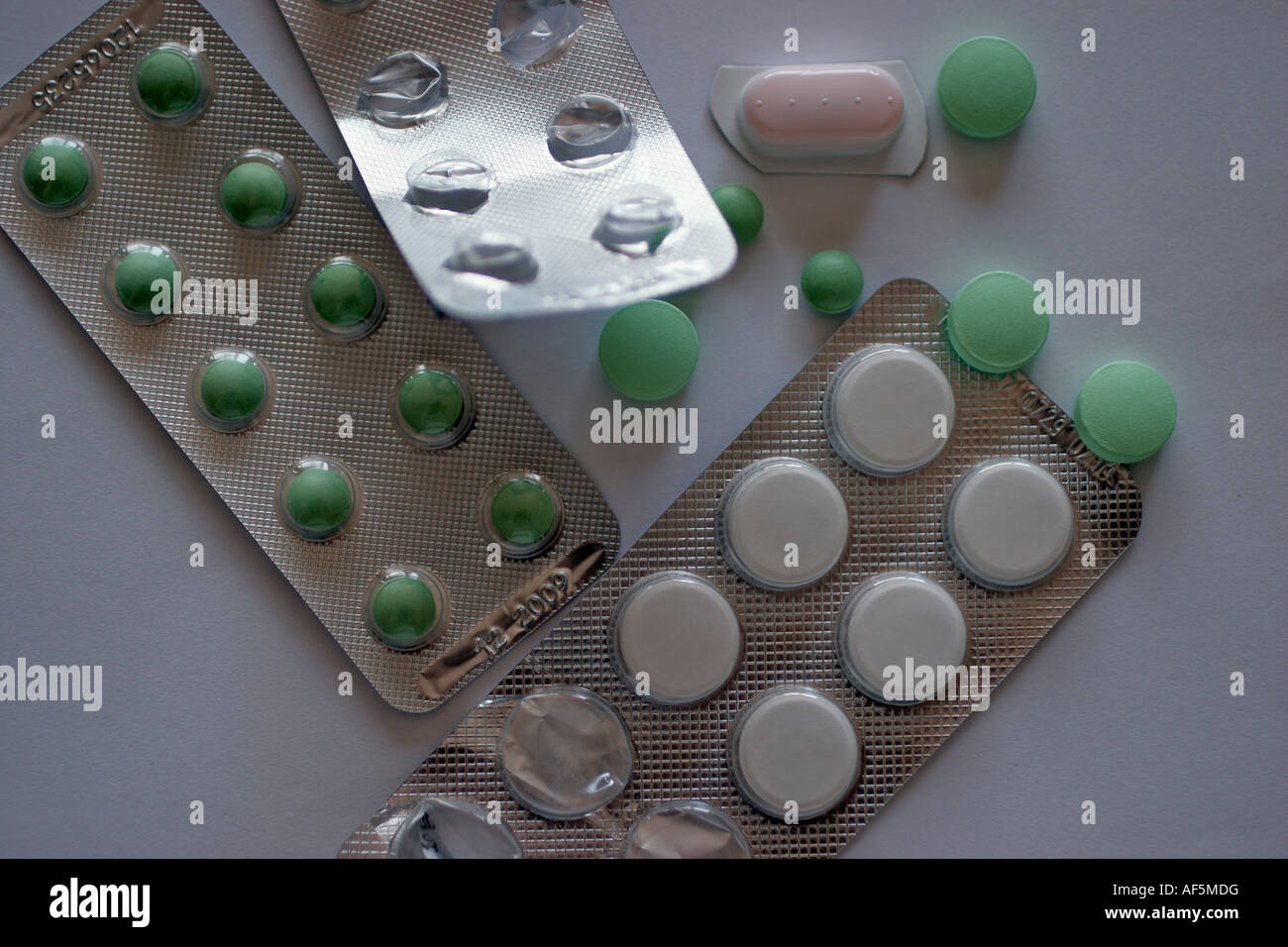 Still life with pharmaceutics drugs of different colors and setup Stock ...