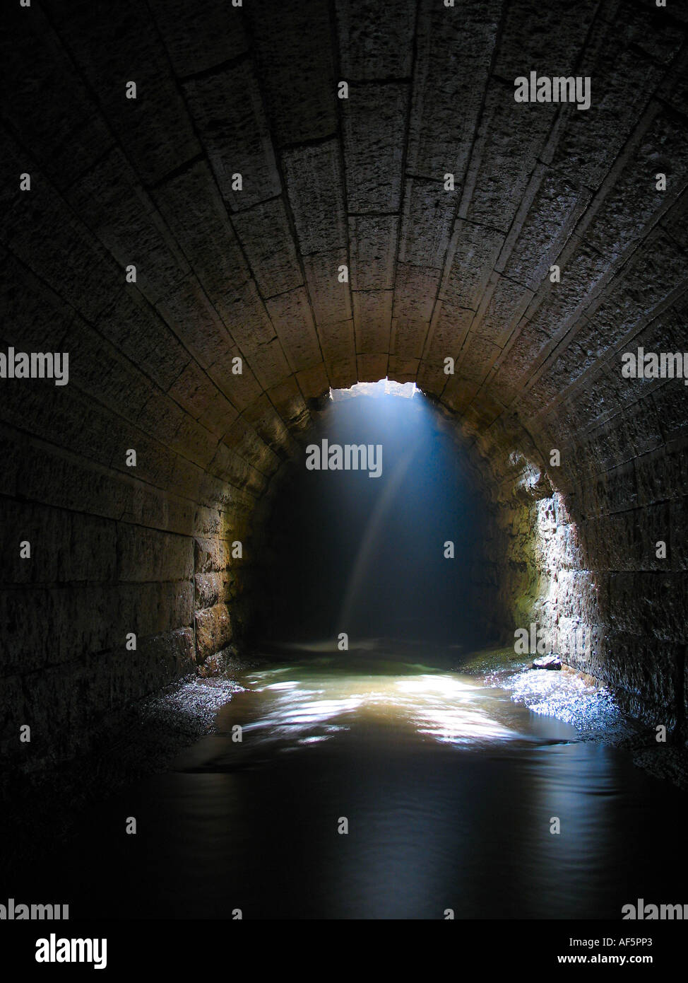 Arched Limestone Underground Storm Drain Tunnel Stock Photo - Alamy