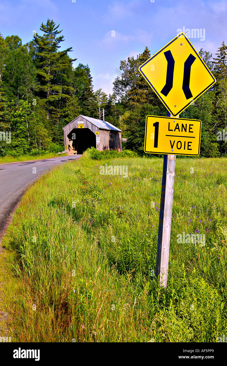 Highway warning sign of a single lane Covered Bridge Stock Photo - Alamy