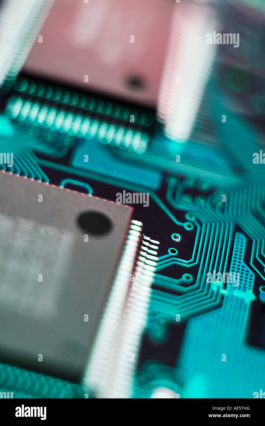 Circuit board and microchip image in cyan and red Stock Photo - Alamy