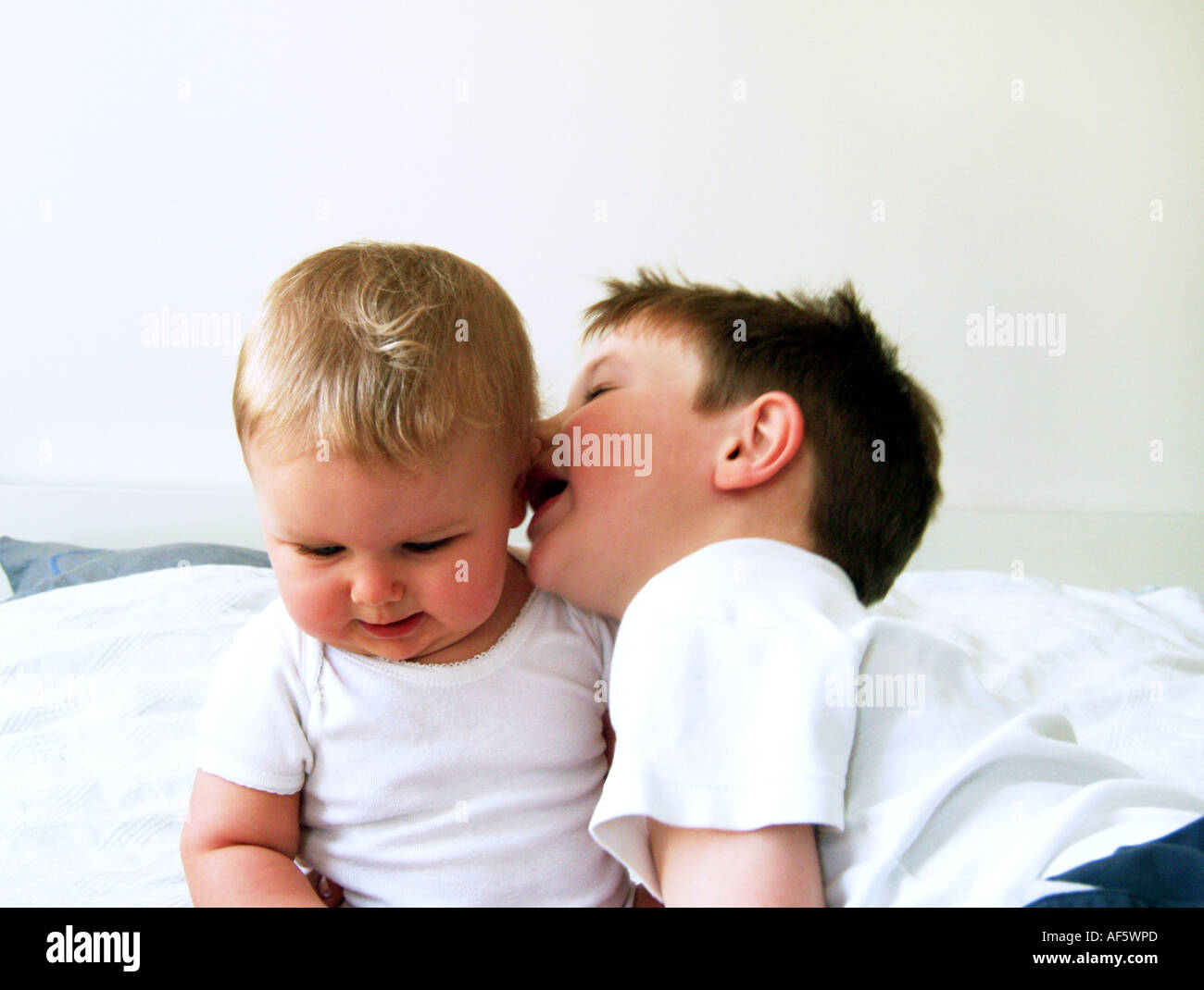 The brothers kiss hi-res stock photography and images - Alamy