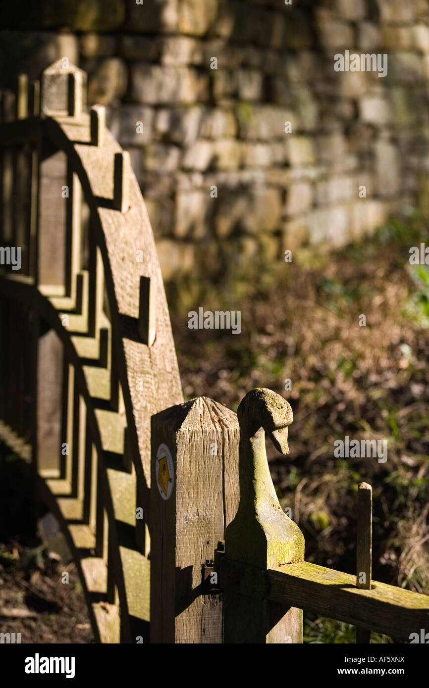 Kissing gate and swans head decorative woodwork on the Cotswold Way ...
