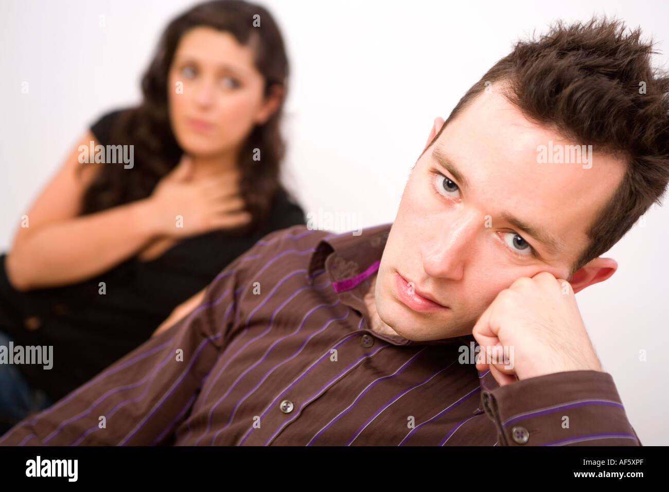 Young couple not communicating and having an argument Stock Photo - Alamy