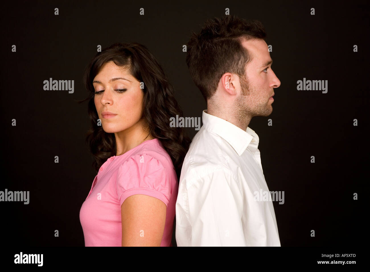 Couple having an argument and ignoring each other Stock Photo - Alamy