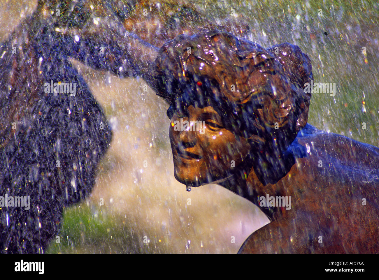 Statue of woman in fountain Stock Photo - Alamy
