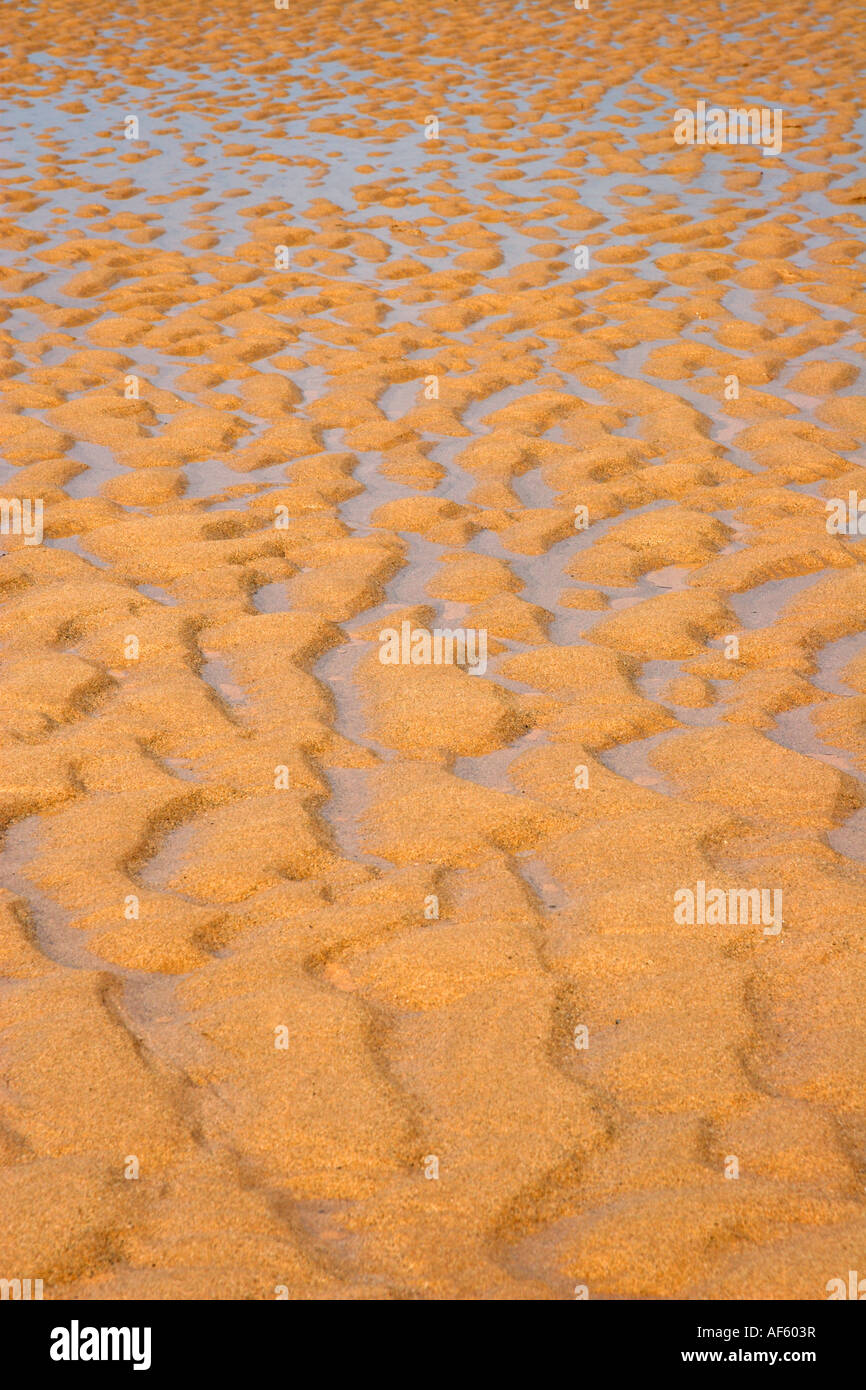 Sand patterns on beach, Cornwall, England, UK Stock Photo - Alamy