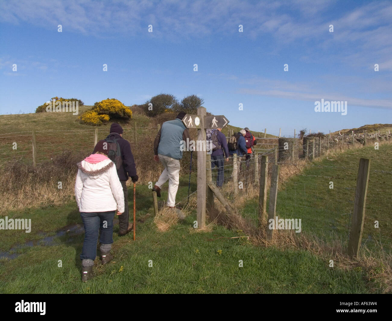 PORTH WEN ISLE OF ANGLESEY NORTH WALES UK April Group of men and women ...