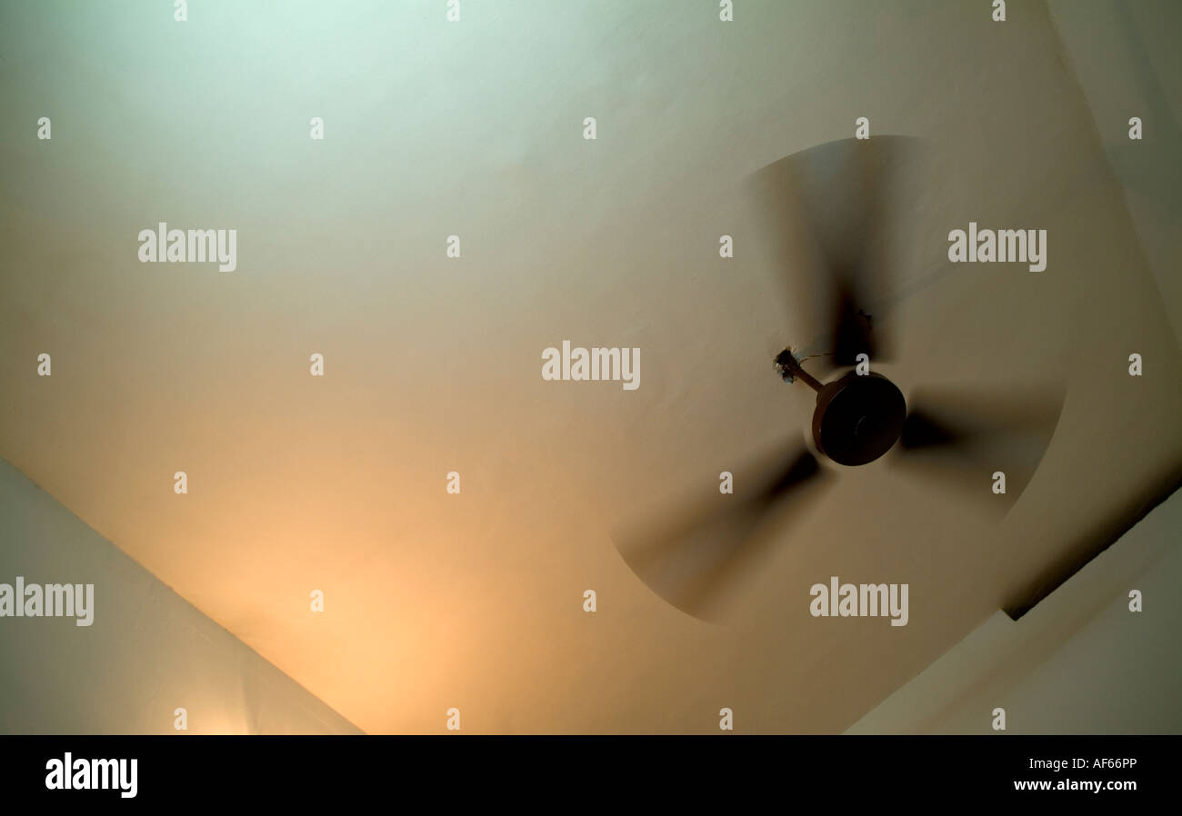 A ceiling fan spinning in a hotel room in Asia Stock Photo - Alamy