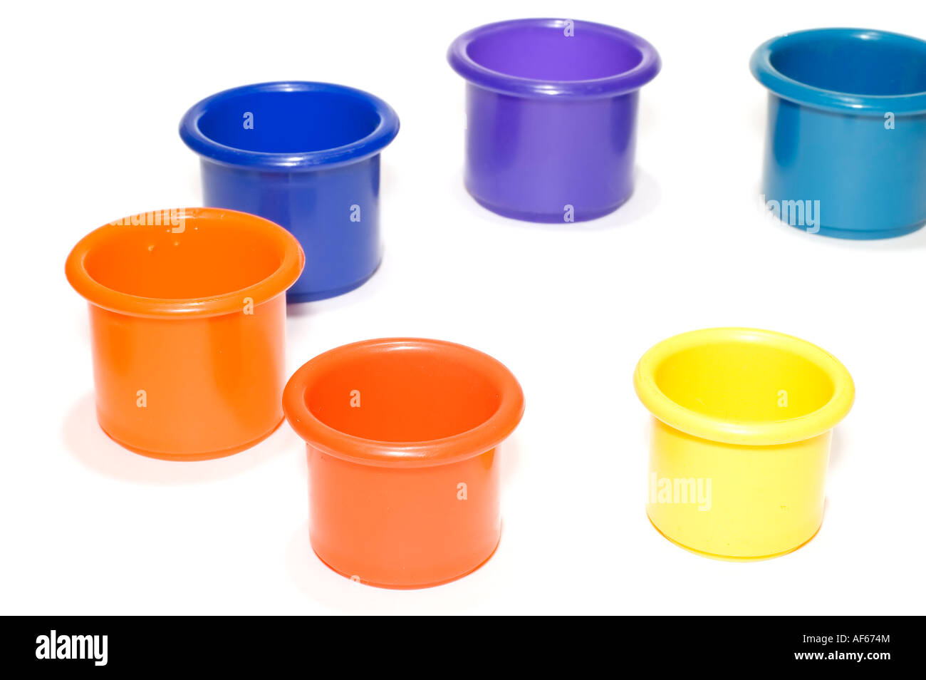 series object on whitetoy colored bucket Stock Photo - Alamy
