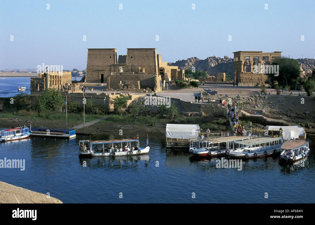 Egypt Aswan Boats on Nile River by Temple of Philae Stock Photo - Alamy