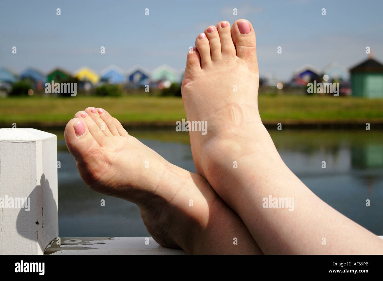 Putting your feet up on holiday Stock Photo - Alamy