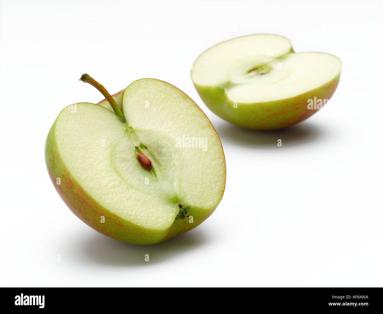Halved green apple hi-res stock photography and images - Alamy
